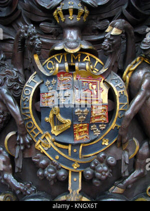 This armorial panel displays heraldic designs representing noble or ...