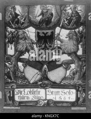 This armorial panel displays heraldic designs representing family or ...