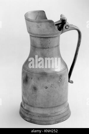 A historical flagon used for holding liquids, demonstrating functional ...