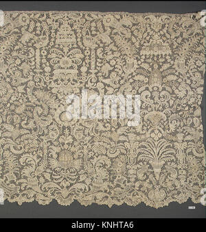 This flounce is a decorative fabric trim with intricate lacework ...