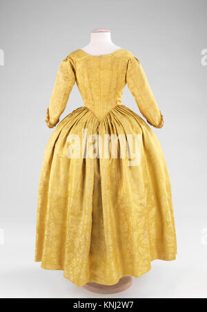 A period dress illustrating style, craftsmanship, fabric, design, and ...