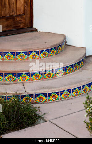 Colorful tiles on a stairway, closeup detail view of decorative tile ...