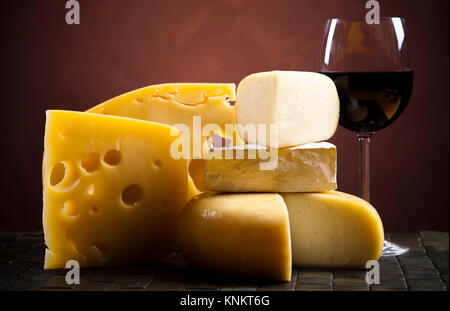 Cheese and wine, saturated ambient rural theme Stock Photo - Alamy
