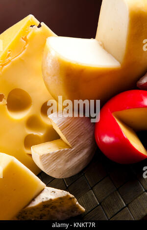 Cheese composition, saturated ambient rural theme Stock Photo - Alamy