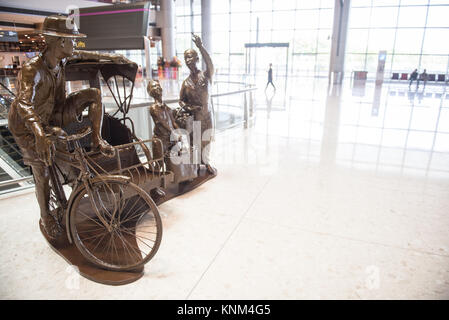 Hey, Ah Chek a bronze sculpture created by Singaporean sculptor and ...