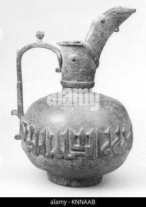 A metal ewer from the Metropolitan Museum of Art, catalog number 1973. ...