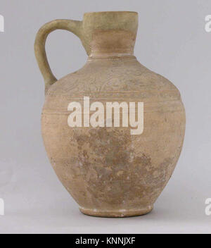This ewer is a historical vessel, showing material, shape, and ...