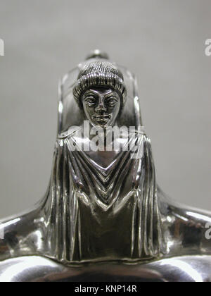 This silver ewer, crafted by Giacinto Melillo around 1890 in Naples ...