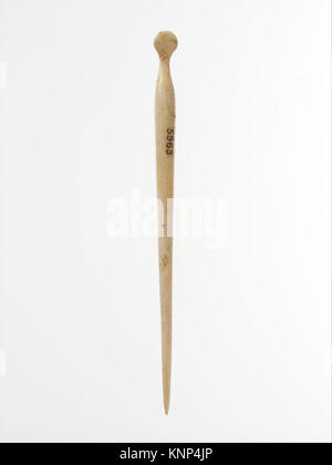 This bone ligula, or ear pick, is an ancient tool used for personal ...