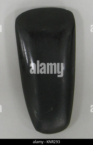 This celt is a prehistoric stone or metal tool, used for chopping or ...