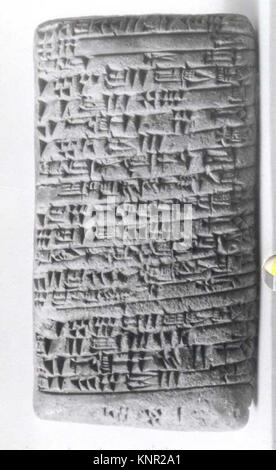A clay tablet featuring cuneiform writing, one of the earliest forms of ...