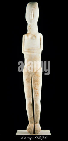 Female Cycladic statue figurine with folded arms of the Spedos and ...