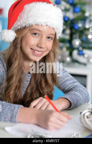 Teen girl writing letter Stock Photo - Alamy