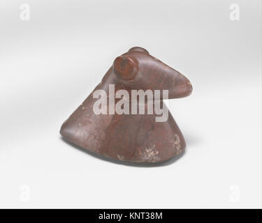 A birdstone, a small carved stone artifact shaped like a bird ...