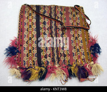 A 'Chuspa' textile bag is a traditional woven pouch, often used by ...