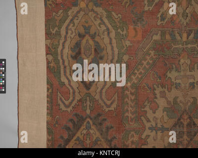 This carpet exemplifies the Caucasian weaving tradition, featuring ...