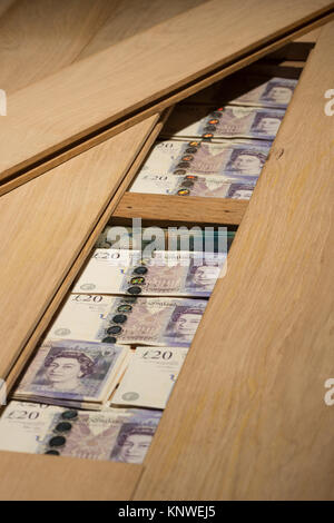 Money under floorboards Stock Photo - Alamy