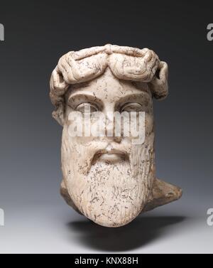 A Roman Bacchus head, 1st/2nd century A.D. White marble. Head of the ...
