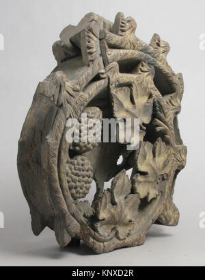 This architectural element, a boss or volute, represents decorative ...