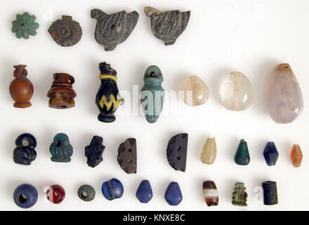 MET collection of Coptic beads and amulets, 4th century, Kharga Oasis ...