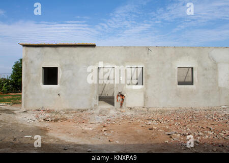Construction of houses in Luanda, Angola Stock Photo - Alamy