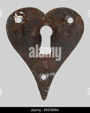 A 16th-century German iron escutcheon plate, preserved in a collection ...