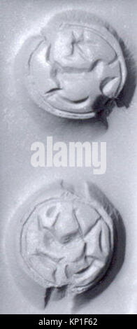 Discoid seal engraved on its convex face, used for stamping impressions ...