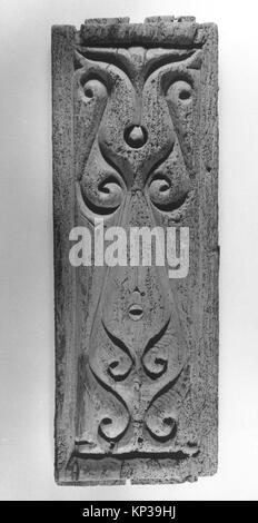 Architectural panel carved in the beveled style, displaying detailed ...