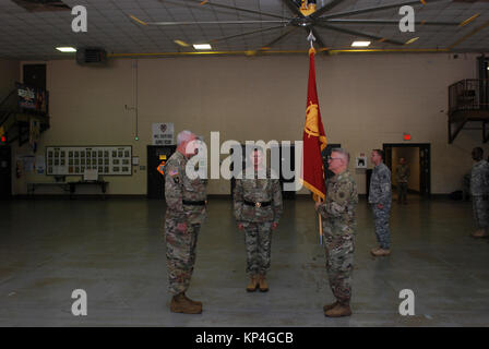 Brig. Gen Steven T. Eveker, Acting Commanding General of the 377th Theater Support Command (left ...