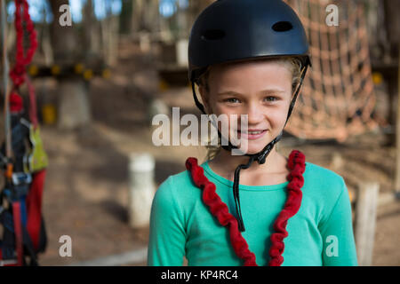 climbing little girl portrait helmet rope safety harness smiling Stock ...