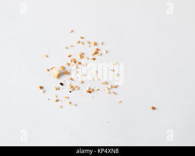Scattered sesame seeds and crumbs isolated on white background Stock ...