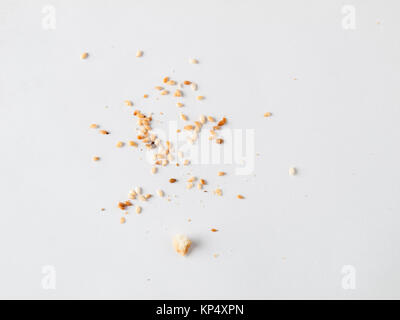 Scattered sesame seeds and crumbs isolated on white background Stock ...
