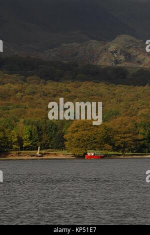 A Swallows and Amazons boat in the Coniston museum, Lake District, UK ...