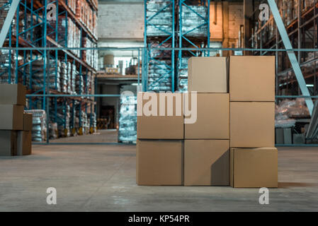 Cardboard boxes in warehouse Stock Photo - Alamy