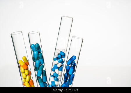 Capsules in test tubes Stock Photo - Alamy