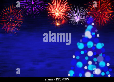 Unfocused Christmas Tree with a Fireworks by Night Stock Photo - Alamy