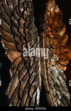 Black metal wings isolated on white background left view. 3d render ...