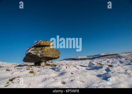 Winter landscape with balancing Norber erratic boulders at Crummack ...