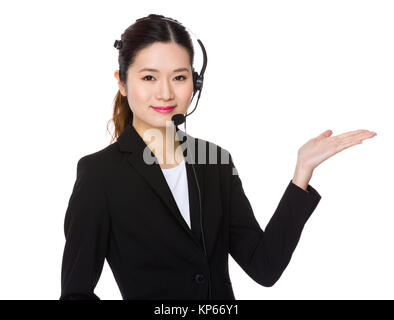 Customer services representative with open hand palm Stock Photo - Alamy