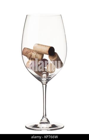 Wine corks in a large glass in the shadow, dark background Stock Photo ...