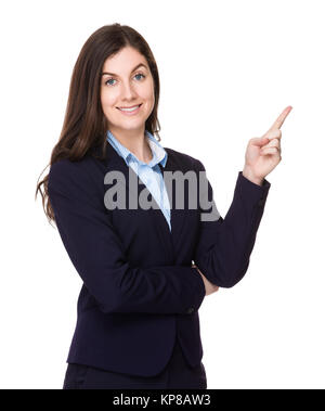 Portrait of nice optimistic brunette lady point empty space wear white ...