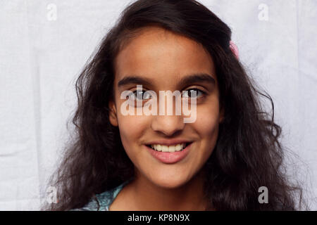 Funny face. Emotional teenager child hold gift on birthday. Funny kid ...