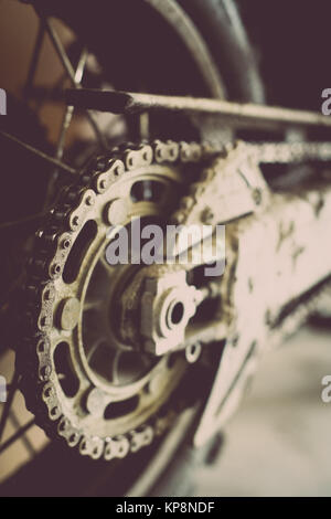 Muddy motorcycle chain Stock Photo - Alamy