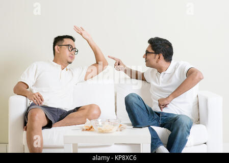 Portrait of the two arguing guys Stock Photo - Alamy