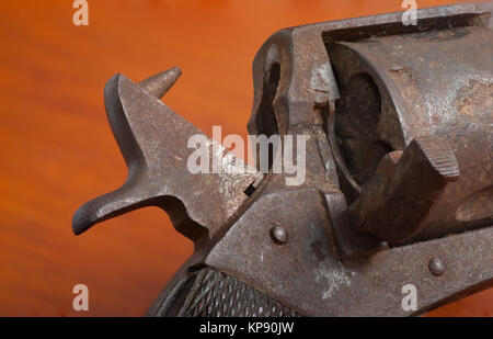 old revolver gun with many bullet shell Stock Photo - Alamy