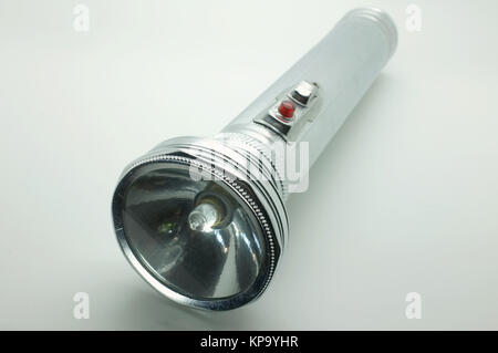 Old metal flashlight, silver torch Stock Photo - Alamy