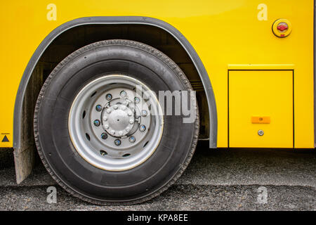 Wheel of the bus on the asphalt Stock Photo - Alamy