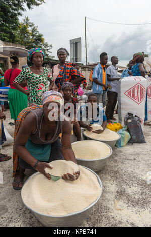 Selling gari at the market in Mafi-Kumase Proper, Volta Region, Ghana ...