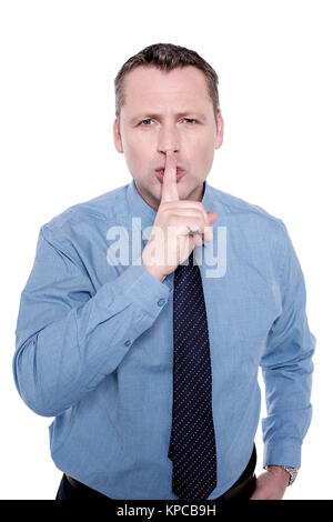 Quiet Please sign with shush gesture image on white brick wall Stock ...