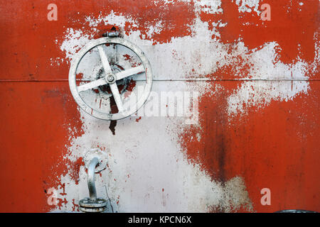 Industrial pipeline blue hand wheel flanges and valve close up ...
